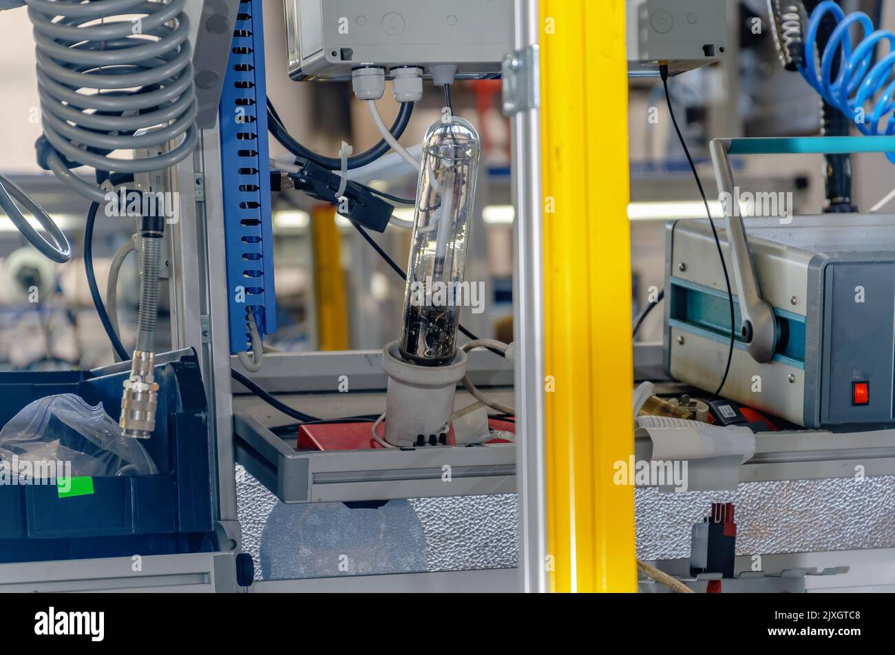 Industrial background. Production of lamps. Industrial equipment at ...