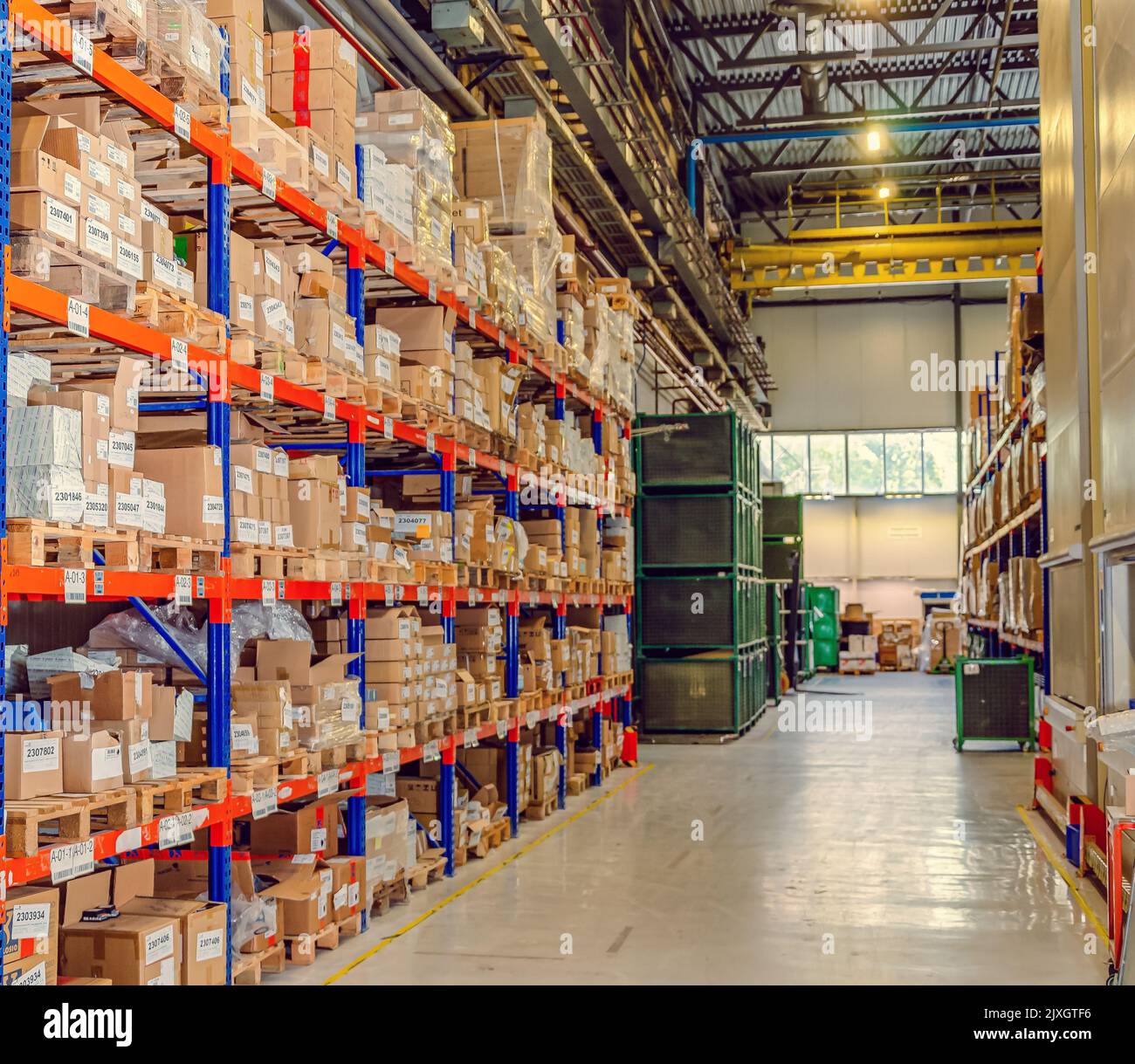 Background cardboard boxes inside warehouse. Logistics center. The ...