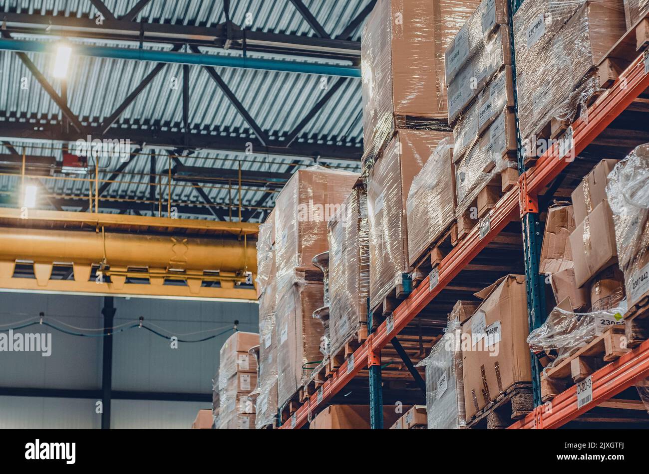 Background cardboard boxes inside warehouse. Logistics center. The ...