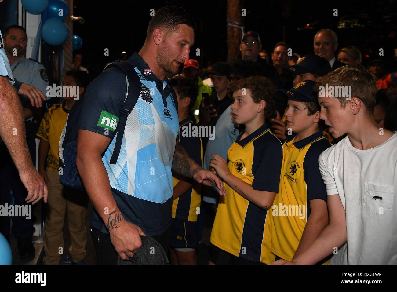 NSW Blues State of Origin player Tariq Sims shakes hands with kids ...