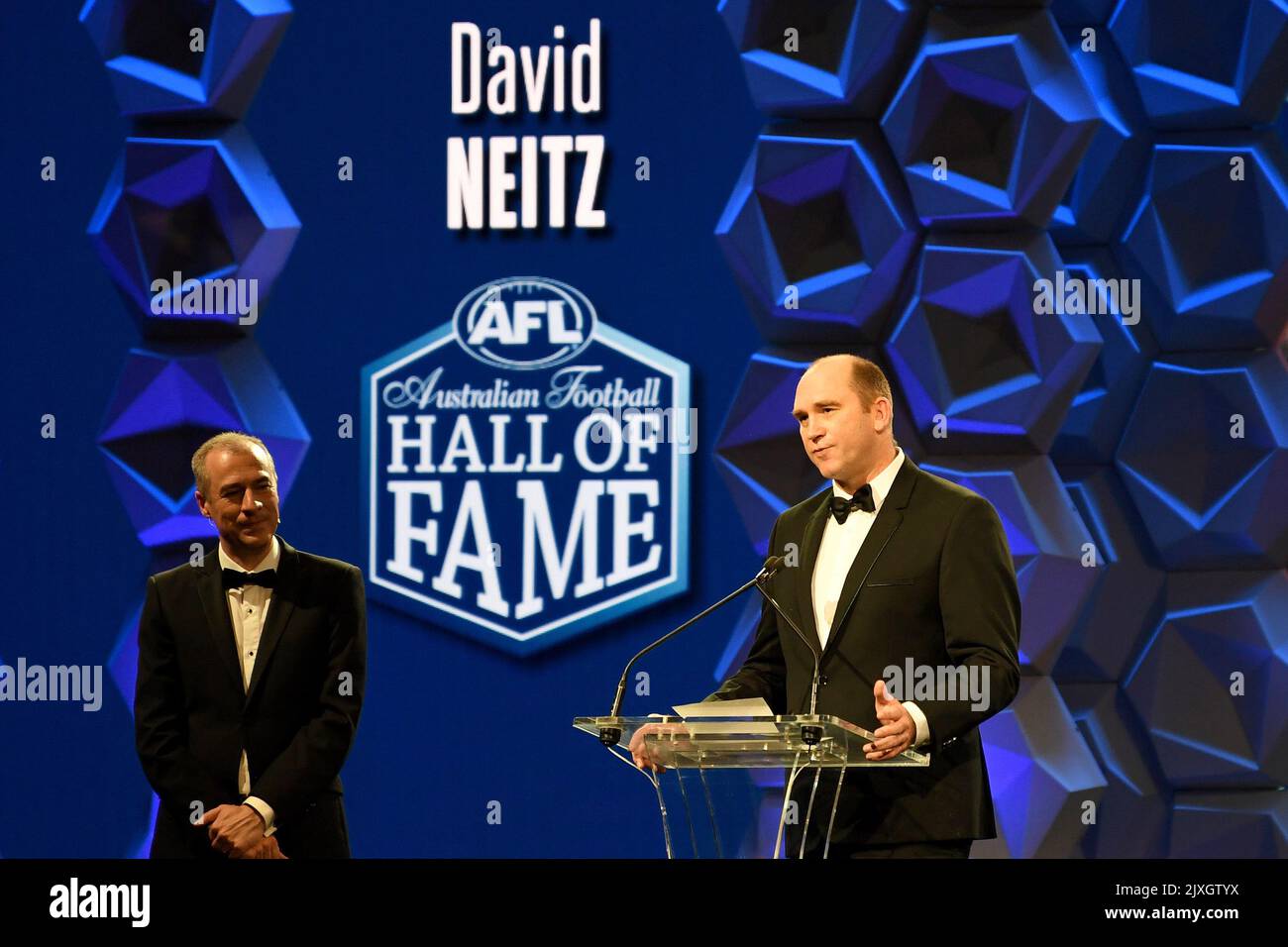 Former Melbourne great David Neitz is presented with his induction at ...