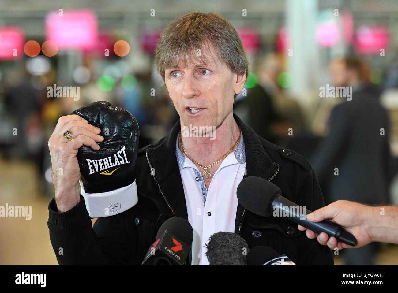 Australian boxer Jeff Horn's trainer Glenn Rushton holds a horse-hair ...