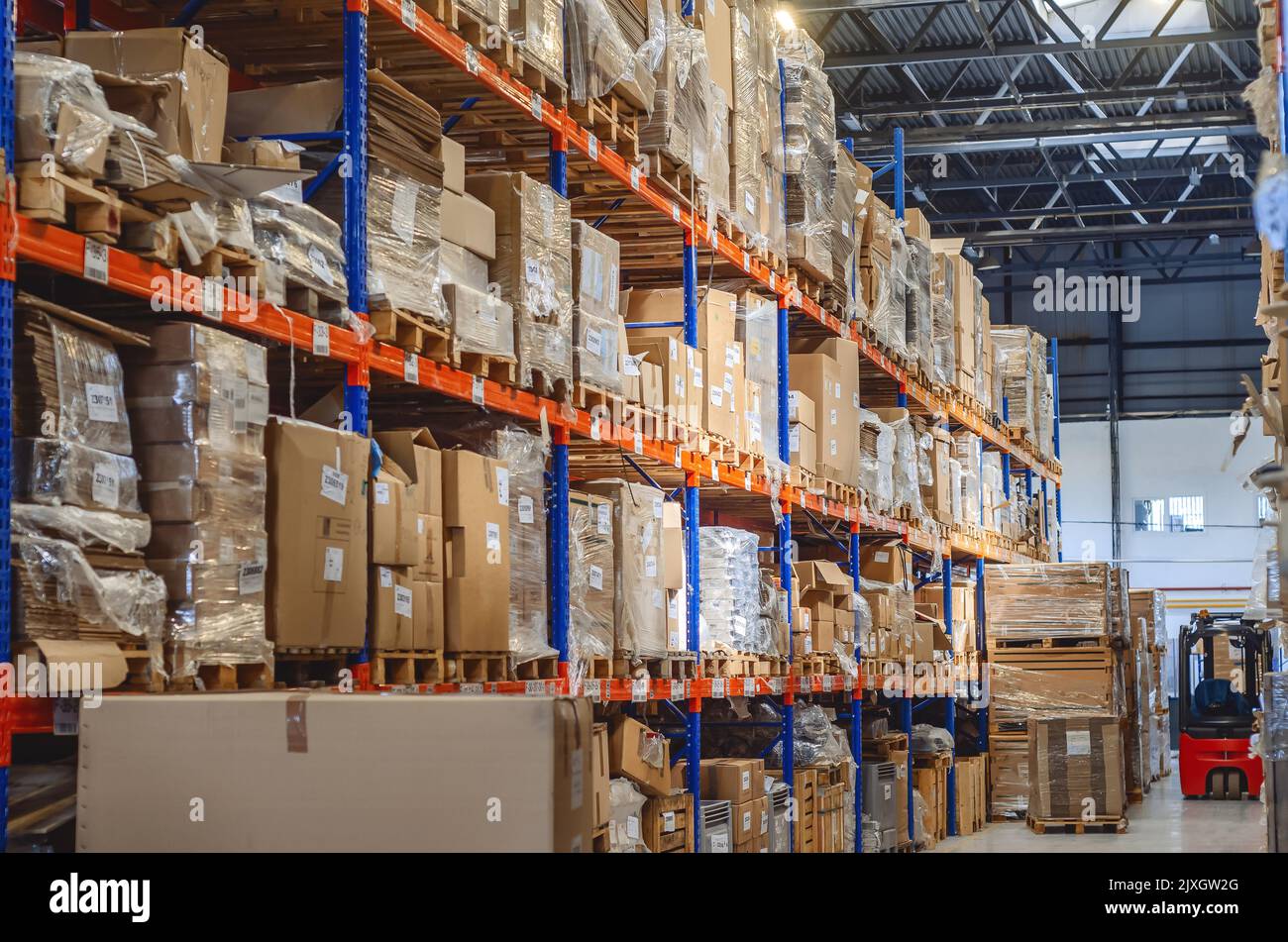 Modern interior of warehouse of finished products. Cardboard boxes on ...
