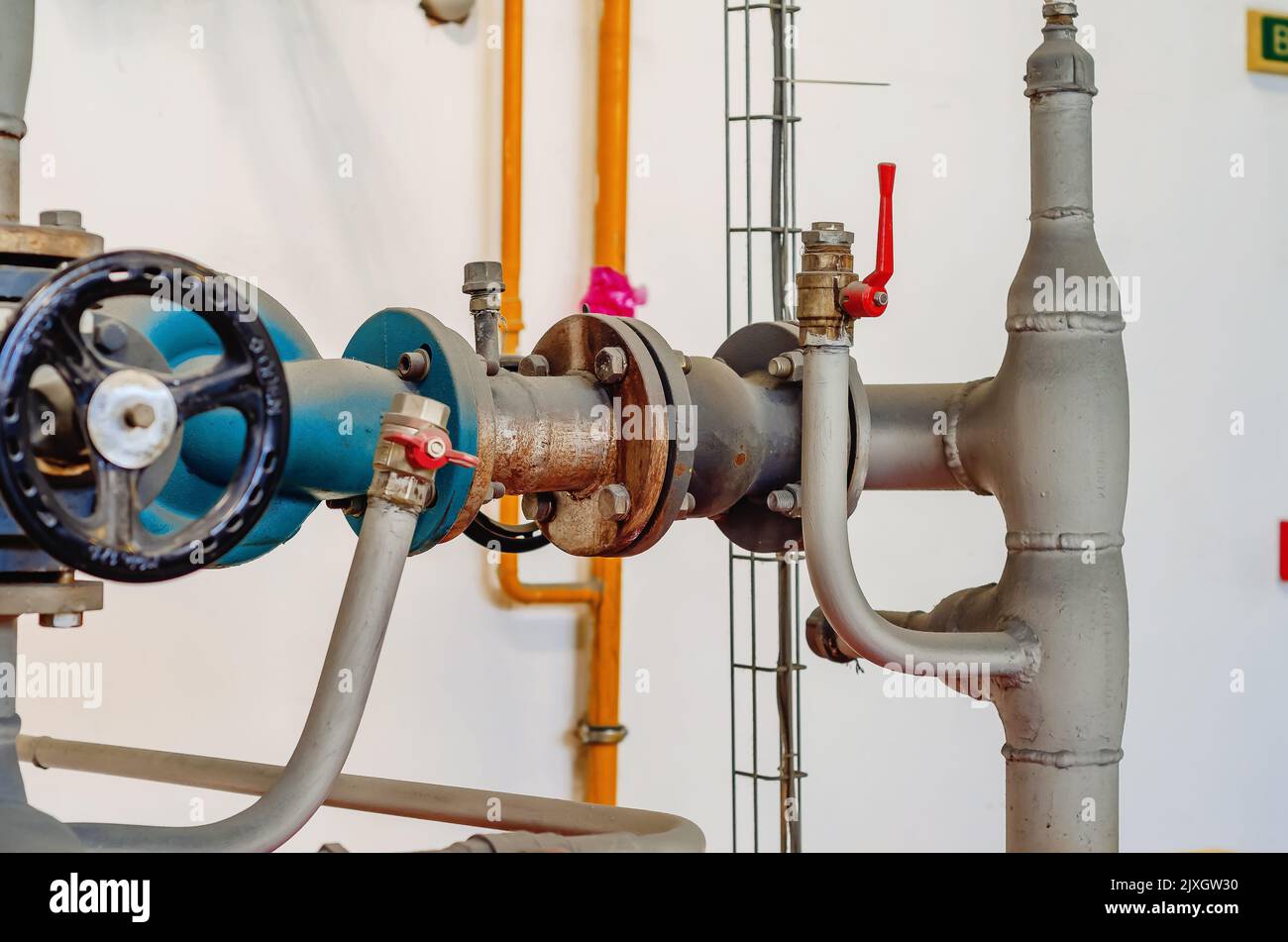 Metal pipes, pipe connections, taps. Industrial production Stock Photo ...