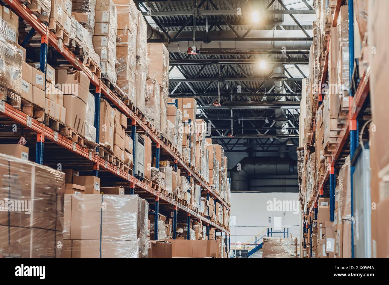 Modern interior of warehouse of finished products. Cardboard boxes on ...