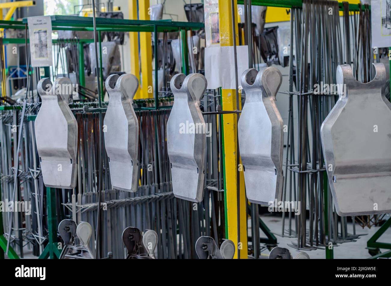 Metal steel industrial hangers, which are used for hanging parts of ...