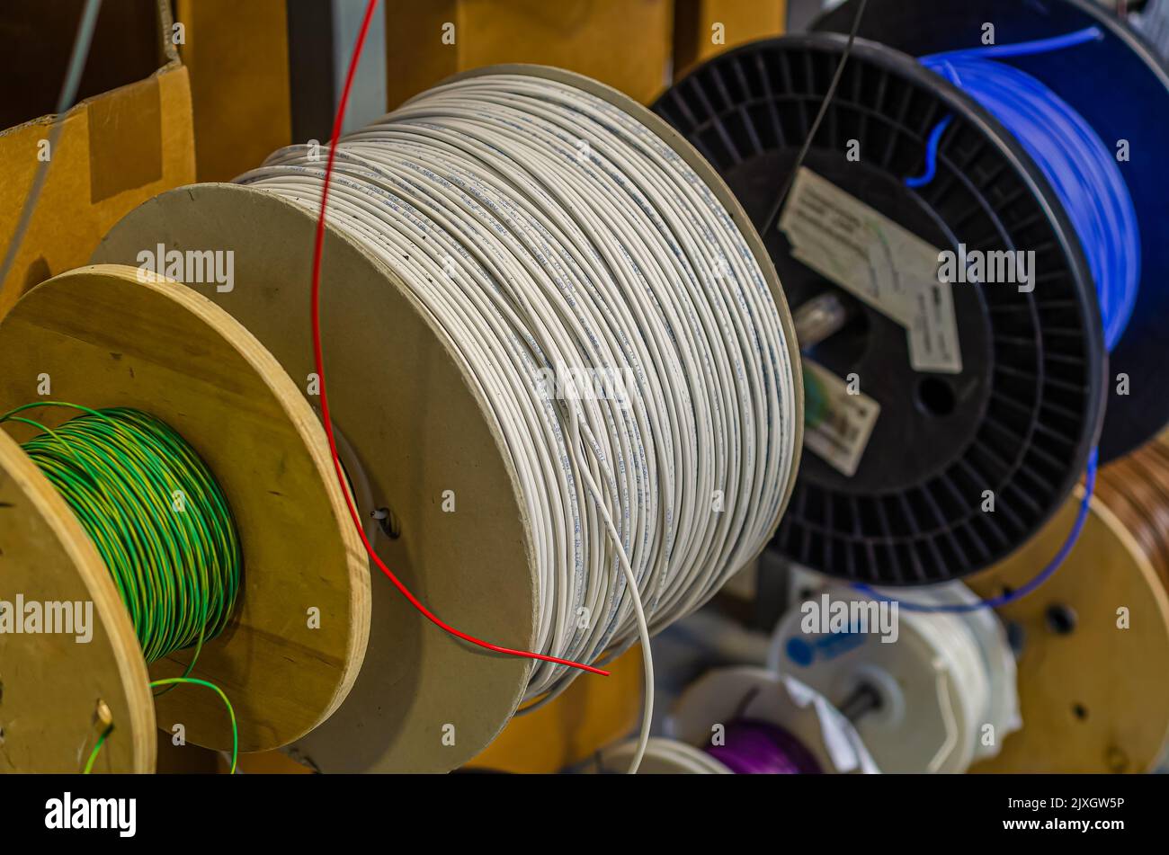 Production of wire, cable in bobbins at plant. Cable plant Stock Photo ...