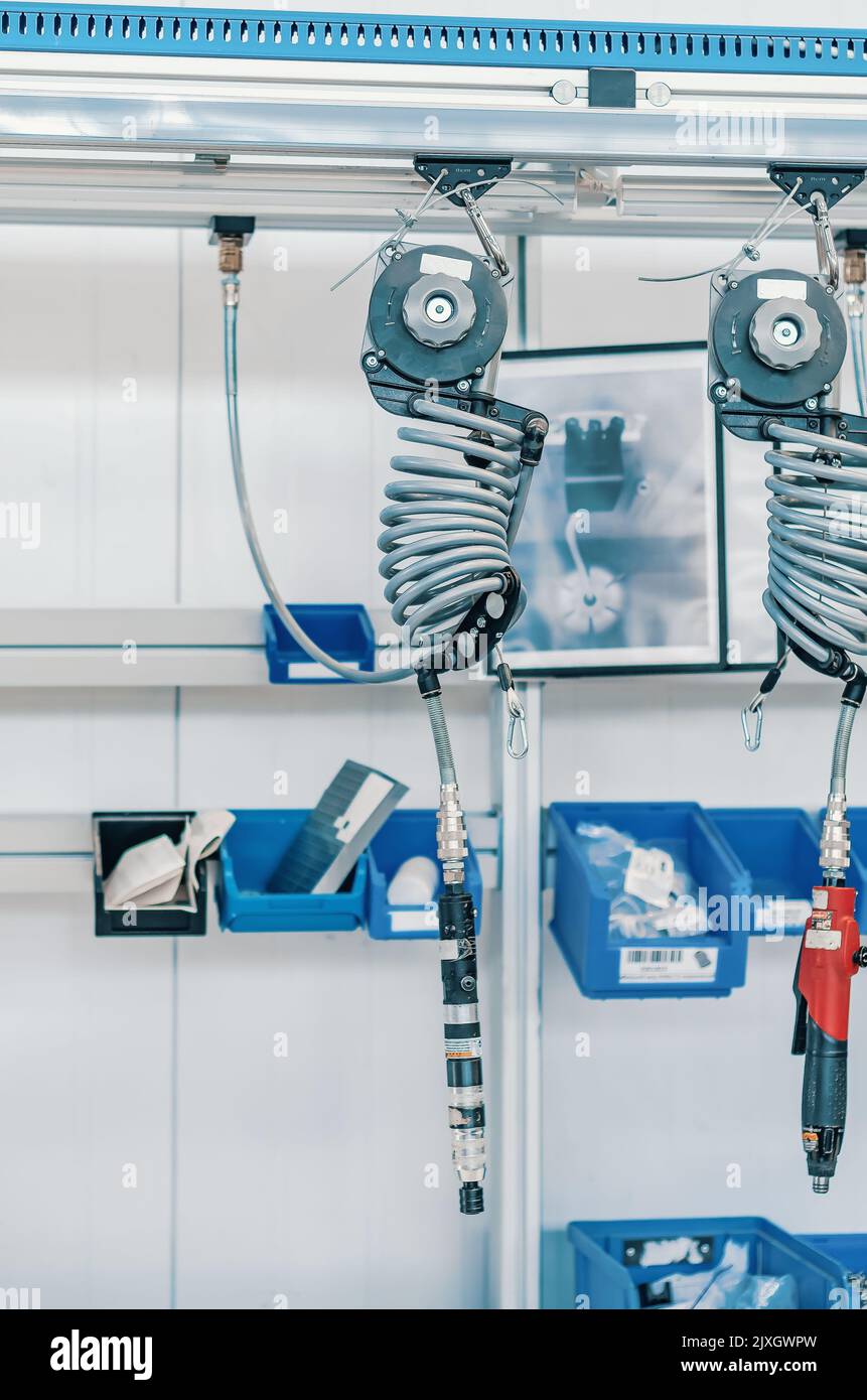 Сlose-up of pneumatic tool in production workshop. Plant for ...