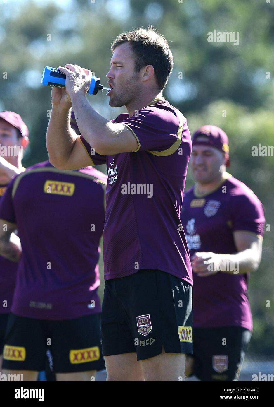 Gavin Cooper takes a drink during the Queensland State of Origin team ...