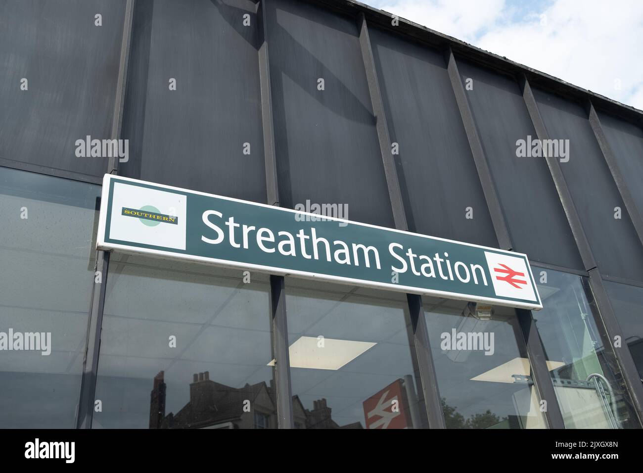 London- August 2022: Streatham Station sign and Southern logo, a ...