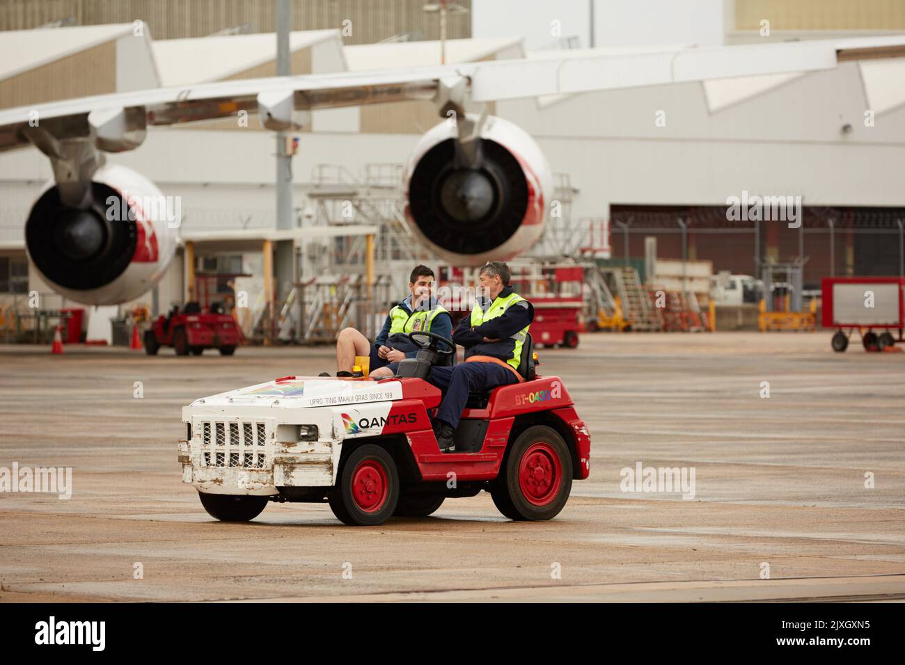 Airport workers are seen at Sydney Airport in Sydney, Friday, June 1 ...