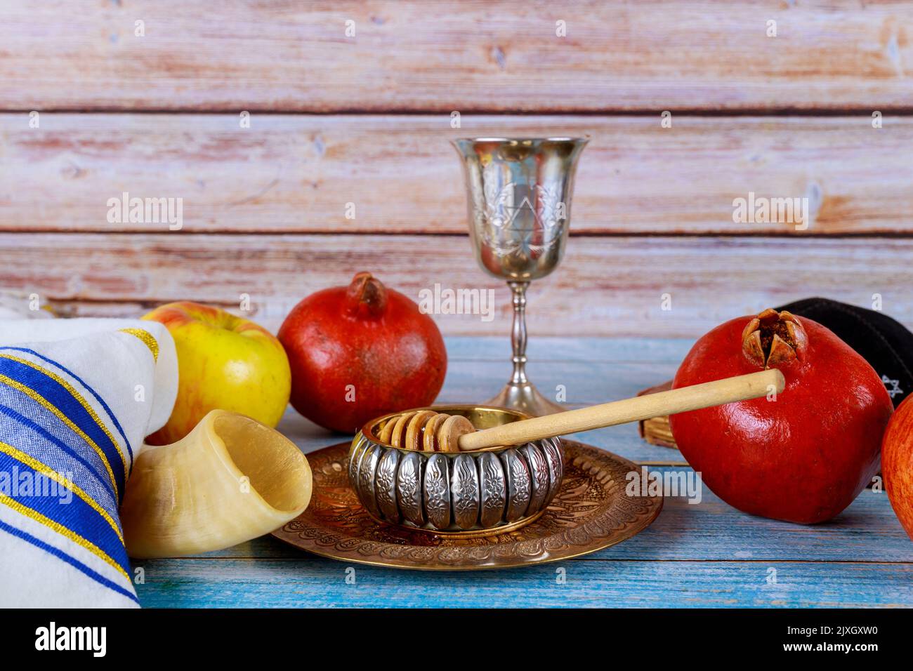 The Orthodox New Year symbols of Rosh Hashanah display a bowl of honey ...