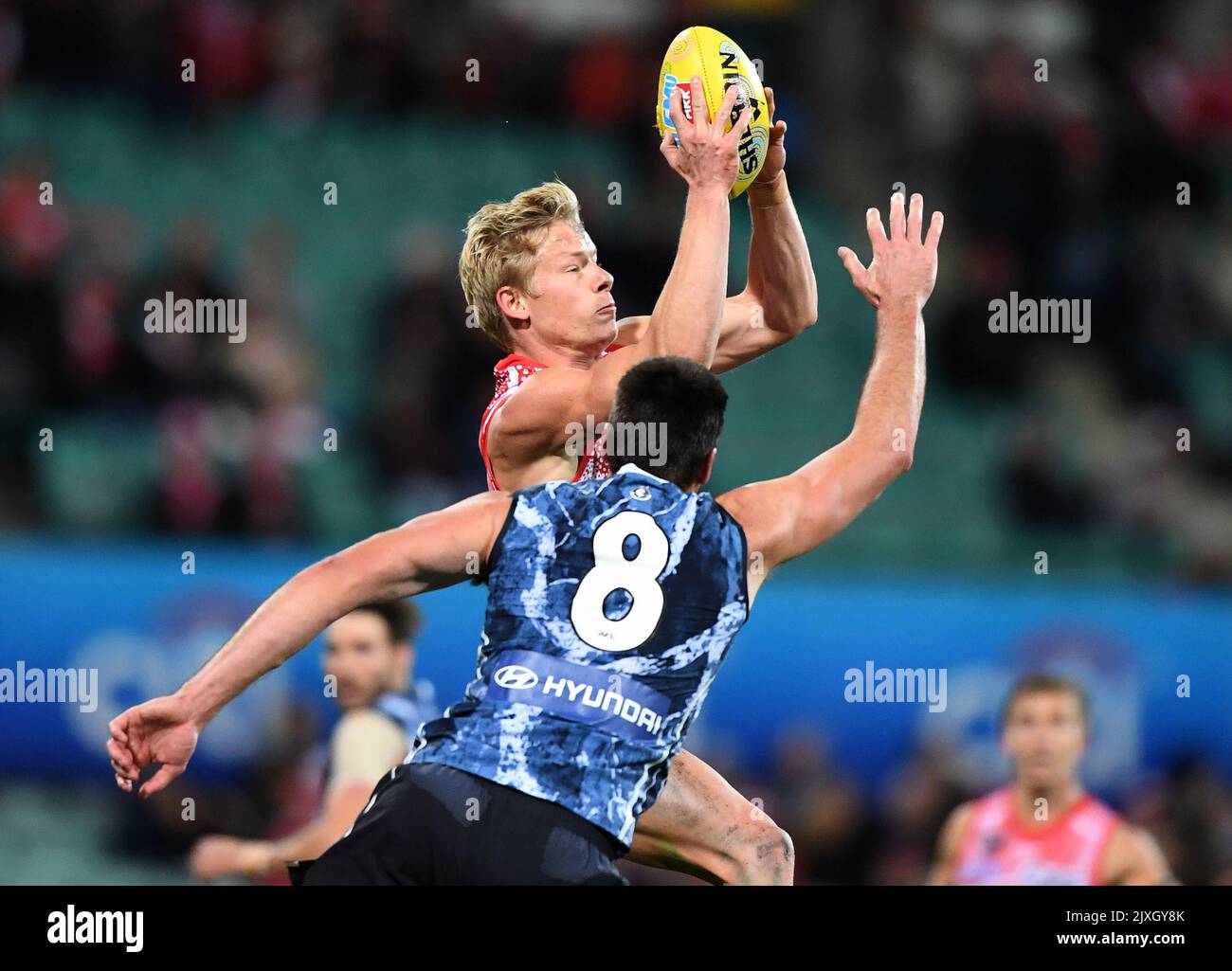 Isaac Heeney of the Swans catches the ball for his mark before scoring ...
