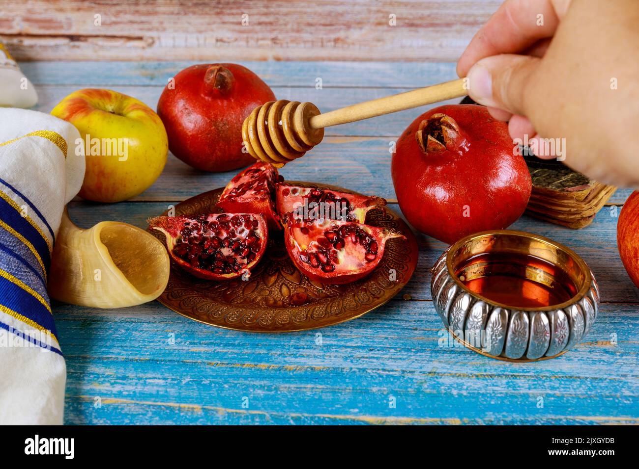 Kosher fruit, pomegranates, apples a honey jar that symbolizes the ...