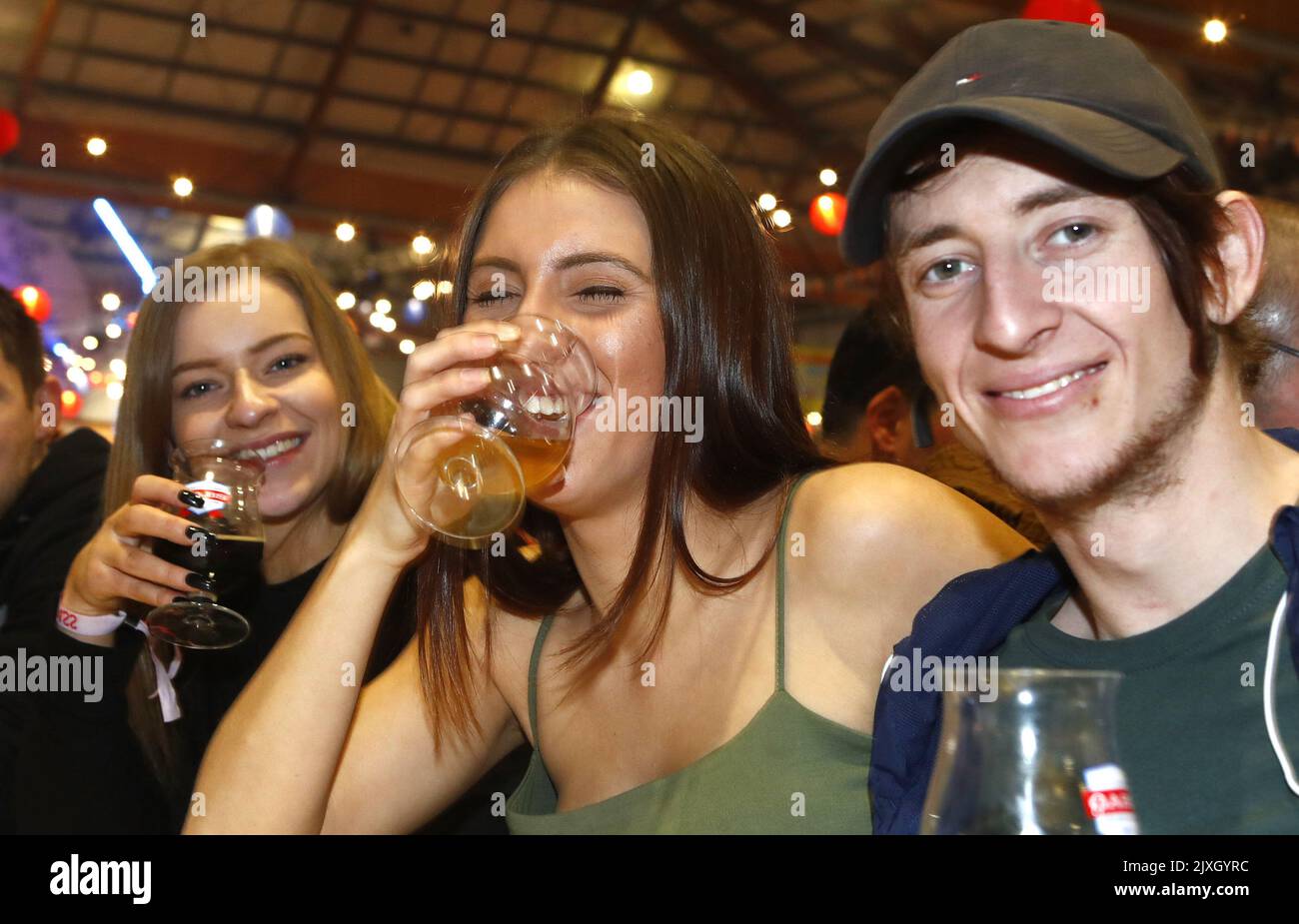 Amelia Wallace, Paige Richardson and Jack Atkins enjoy their beers at ...