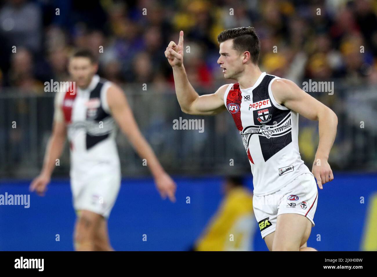 Jack Sinclair of the Saints celebrates kicking a goal during the Round ...