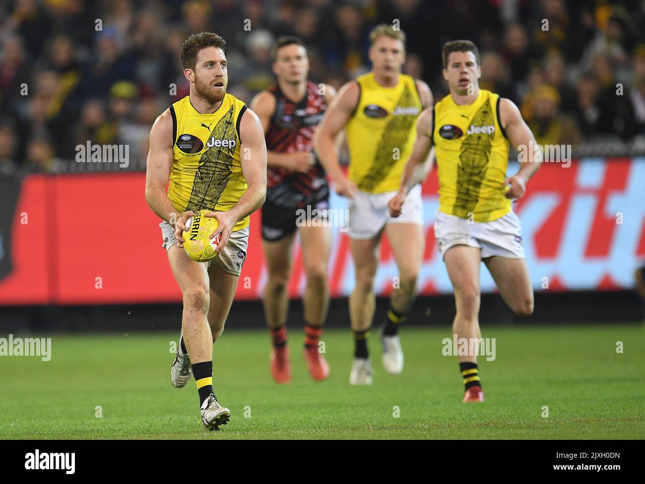 Reece Conca of the Tigers (left) is seen in action during the Round 11 ...