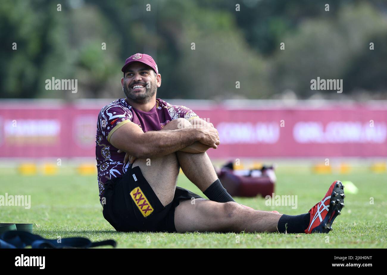 Greg Inglis stretches during the Queensland State of Origin team ...