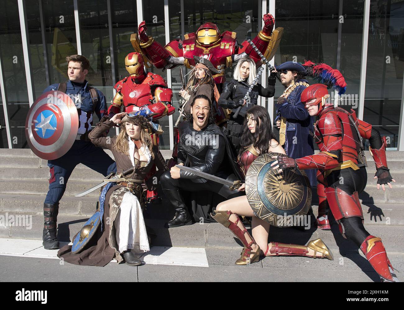Cosplayers dressed as pop culture characters are seen during a media ...