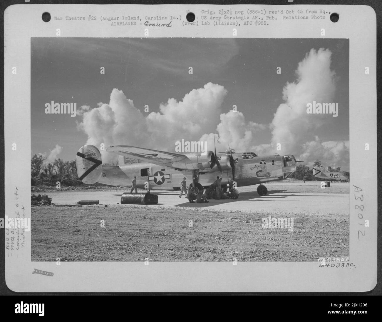 Crew Of The 864Th Bomb Squadron, 494Th Bomb Group, Sit Under The Wing ...