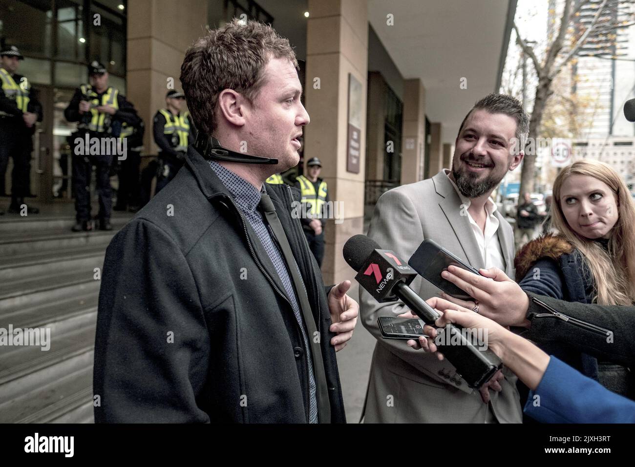 Rick Turner (left) and Neil Erikson speak to media as they leave the ...