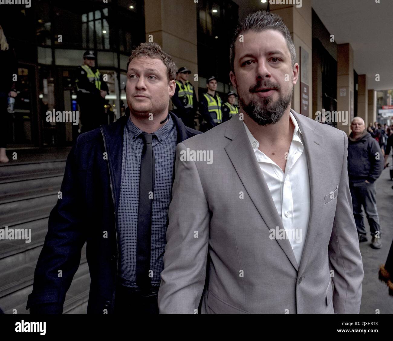 Rick Turner (left) and Neil Erikson leave the Melbourne Magistrates ...