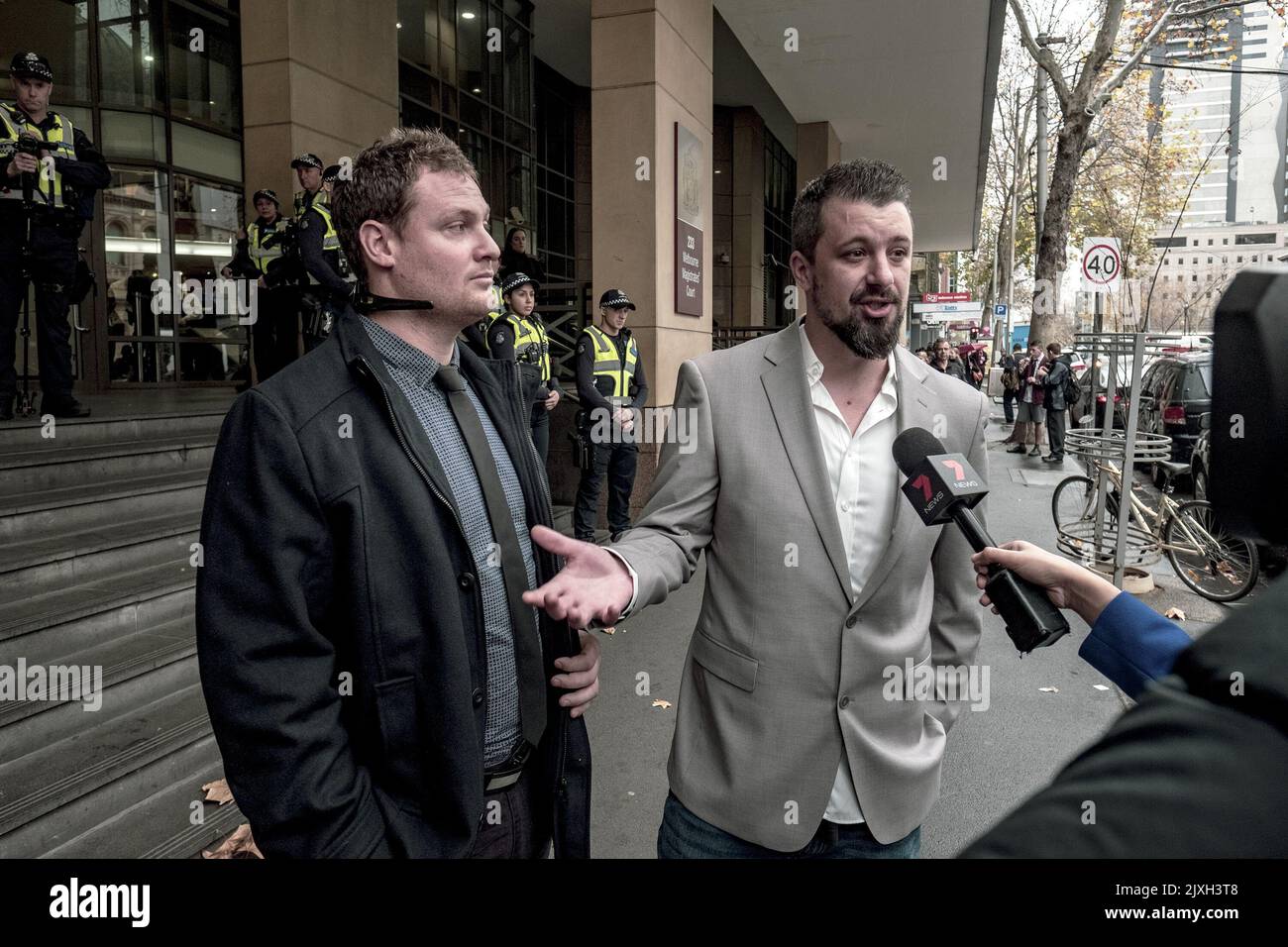 Rick Turner (left) and Neil Erikson speak to media as they leave the ...