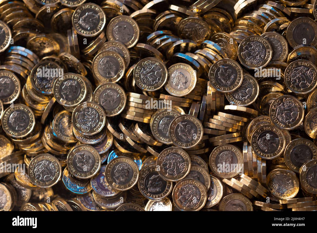 Collection of British pound coins seen from above Stock Photo - Alamy