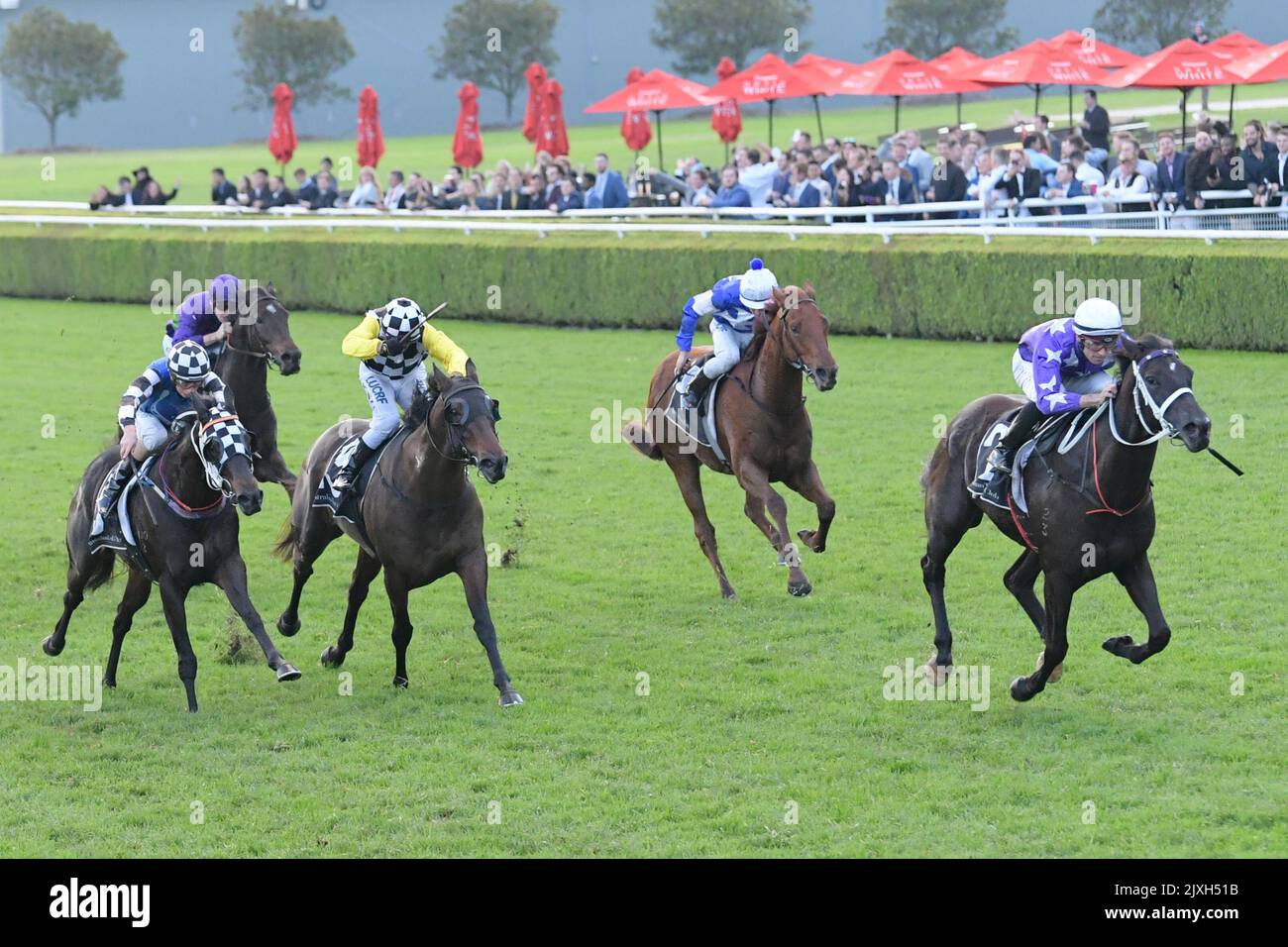 Jockey Tye Angland rides Noire (right) to victory in Race 9, the ...