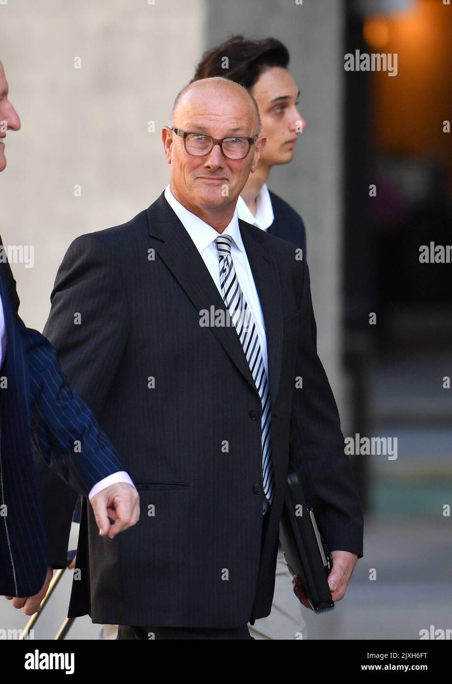 David Pirie (centre) and Lachlan Pirie (right) are seen arriving at the ...