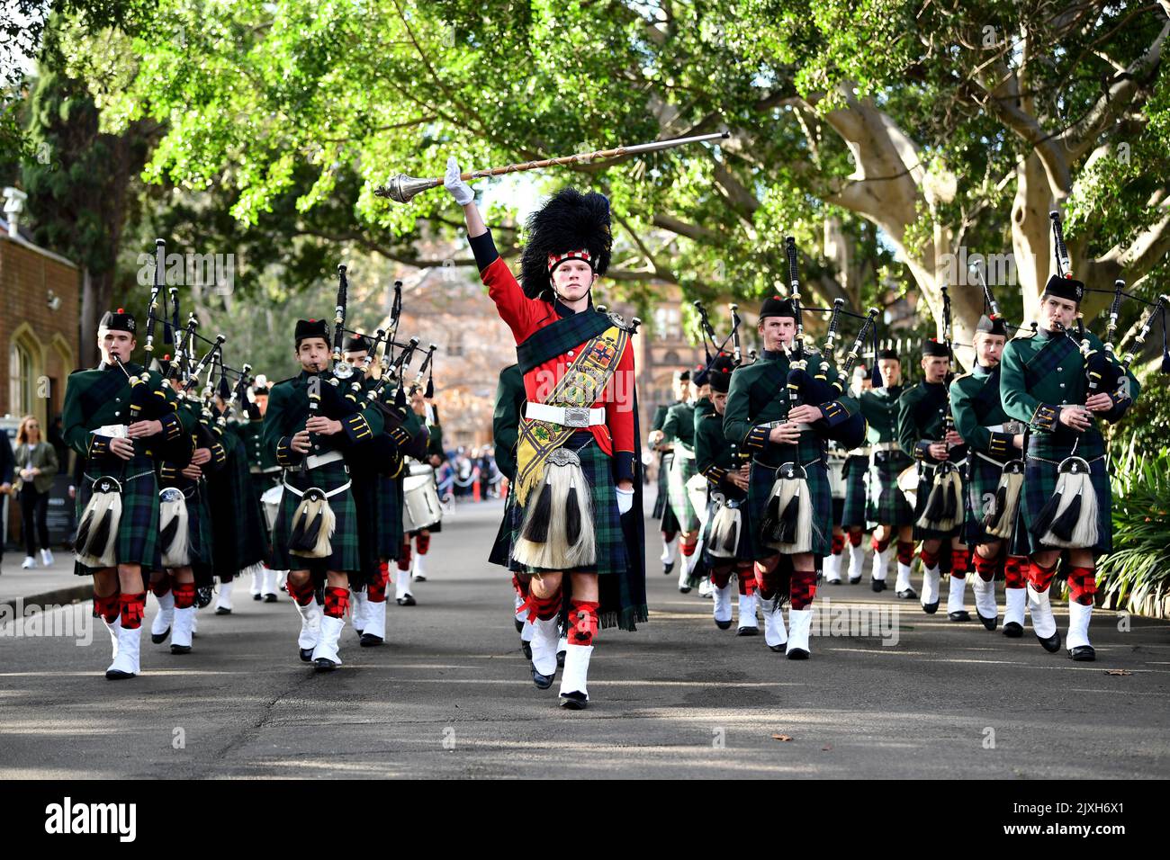 A student band marches at NSW Government House for the Queen's Birthday ...