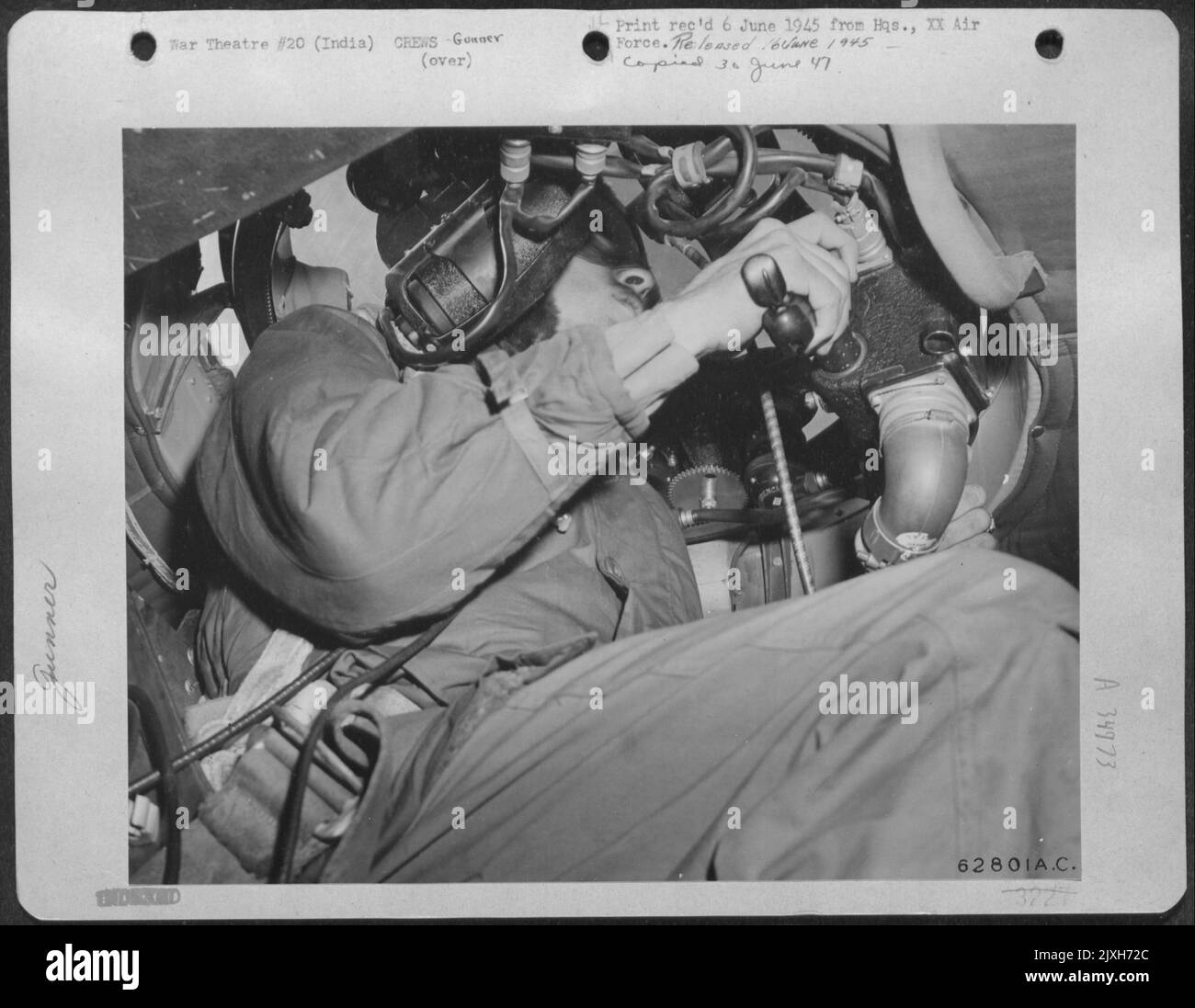 Top Turret Gunner Of A Boeing B-29 "Superfortress" At His Station In ...