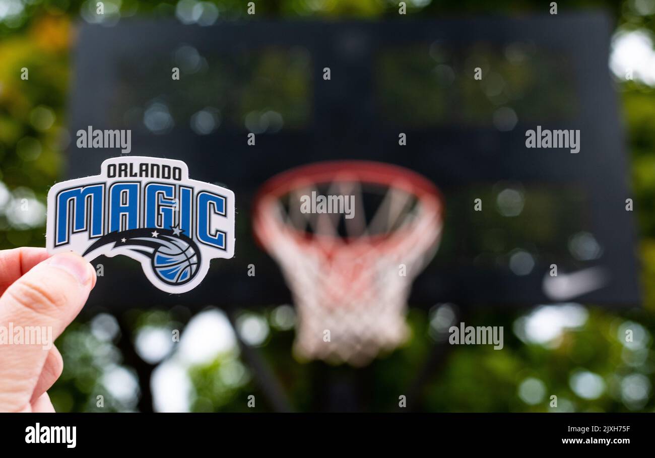 September 15, 2021, Orlando, USA, A man holds the emblem of the Orlando ...