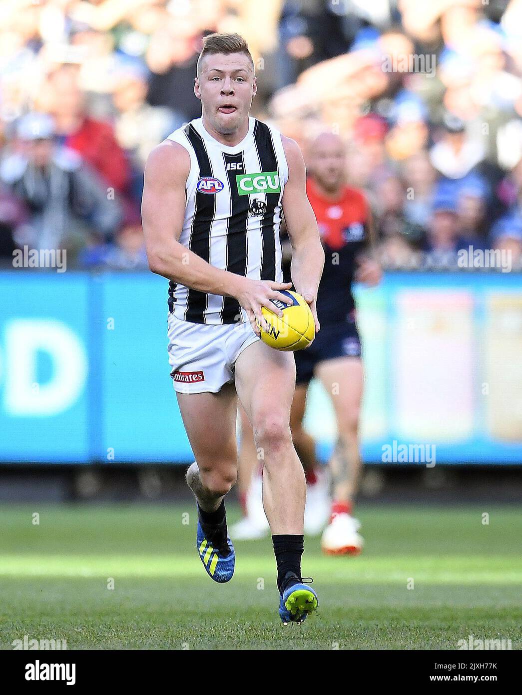 Adam Treloar of the Magpies is seen in action during the Round 12 AFL ...