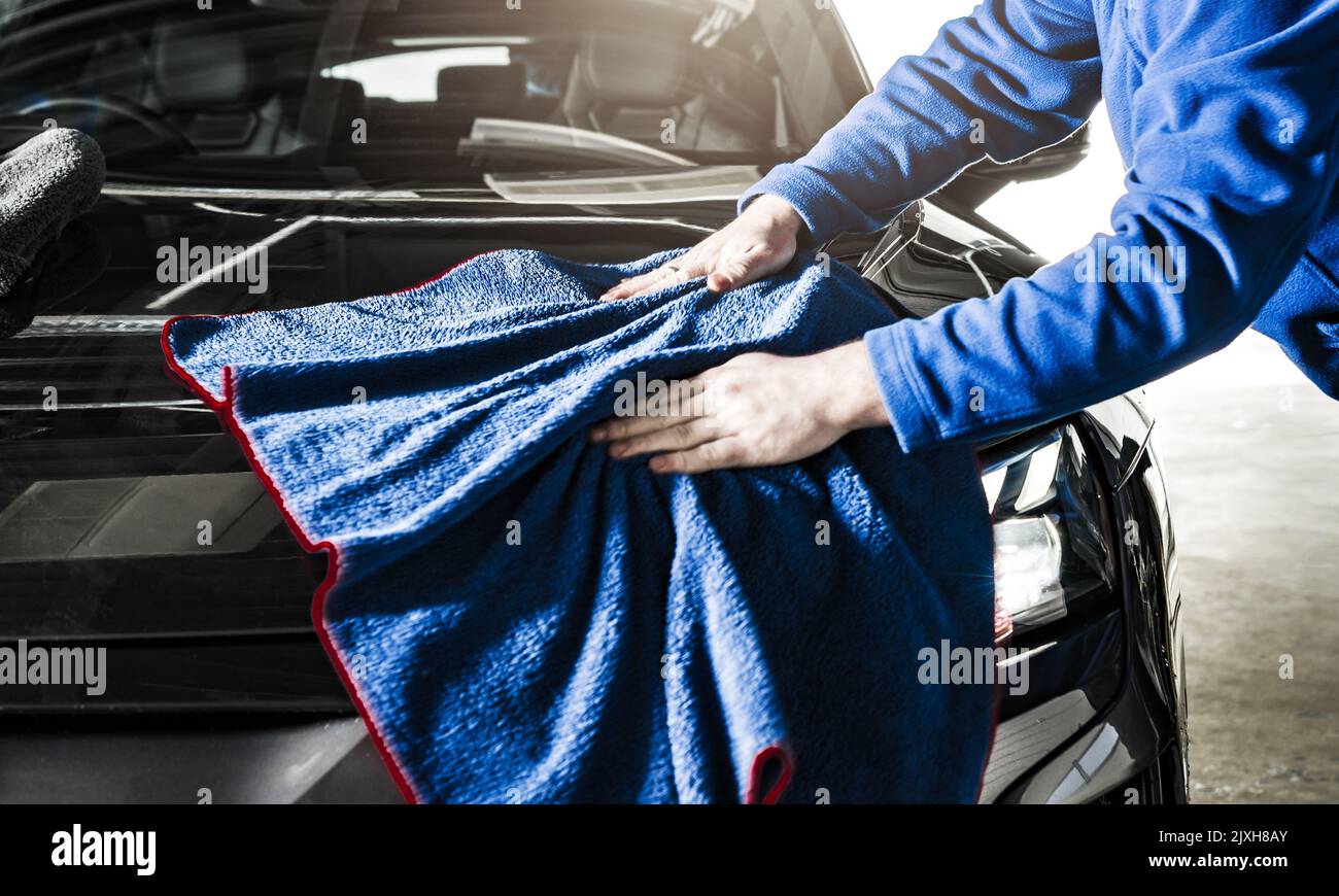 Automotive Industry Theme. Vehicle Detailer Cleaning Car Body Using ...