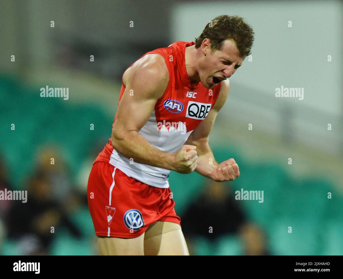 Harry Cunningham of the Swans celebrates kicking a goal during the ...