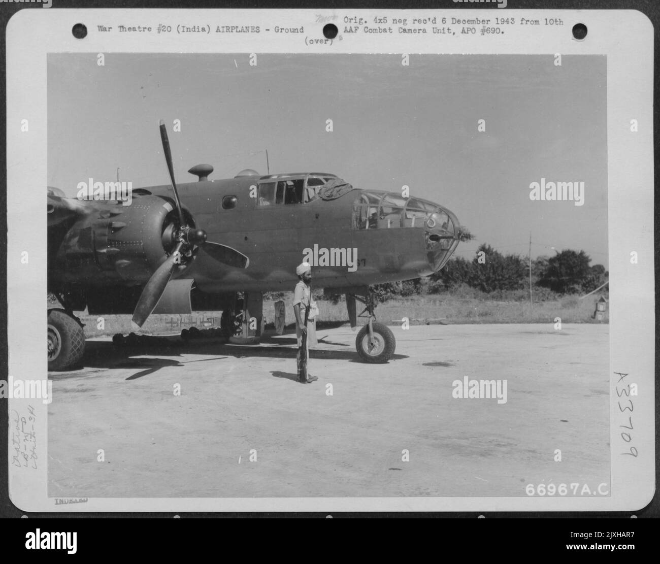 Sikh tribesman guarding a North American B-25 of the 341st Bomb Group ...