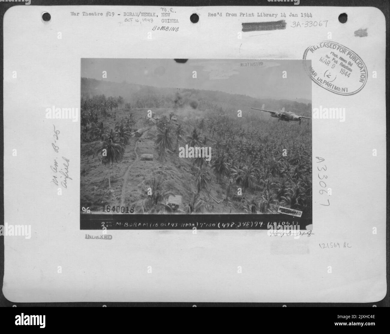 [A B-25 Mitchell Bomber Completes A Low-Level Bomb Run On Boram, New ...