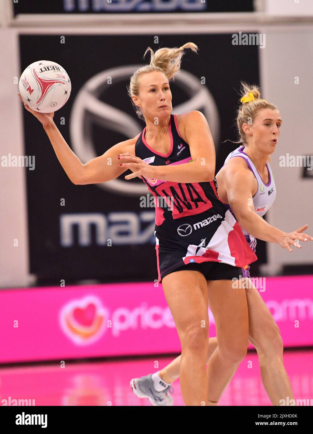 Chelsea Pitman of the Thunderbirds and Gabi Simpson of the Firebirds ...