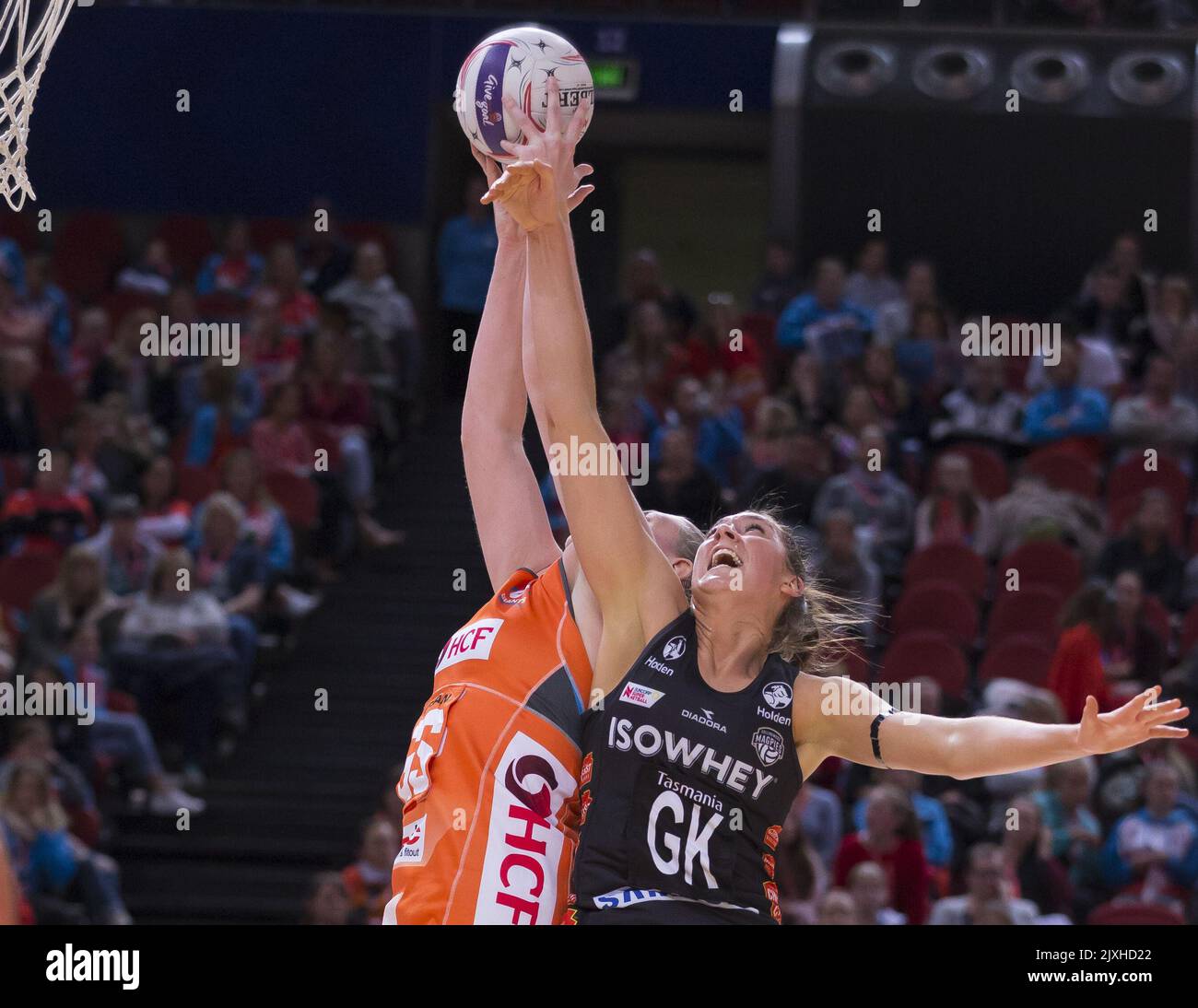 Matilda Garrett of the Magpies and Kristina Brice of the Giants contest ...