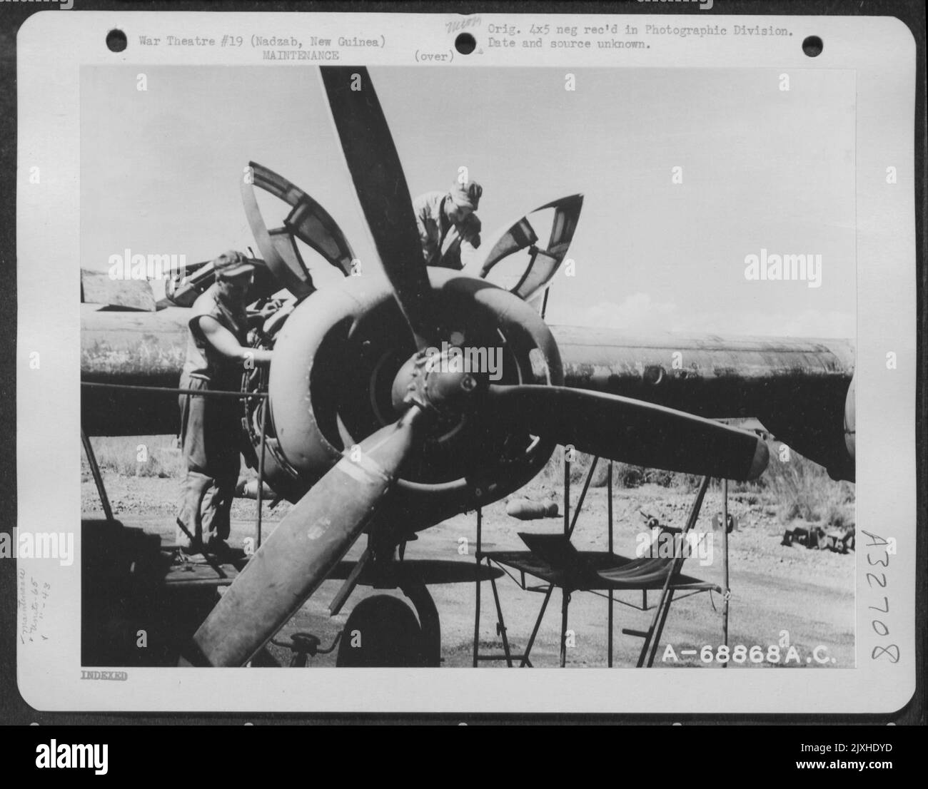 Mechanics Repair One Of The Engines On A Consolidated B-24 Of The 65Th ...
