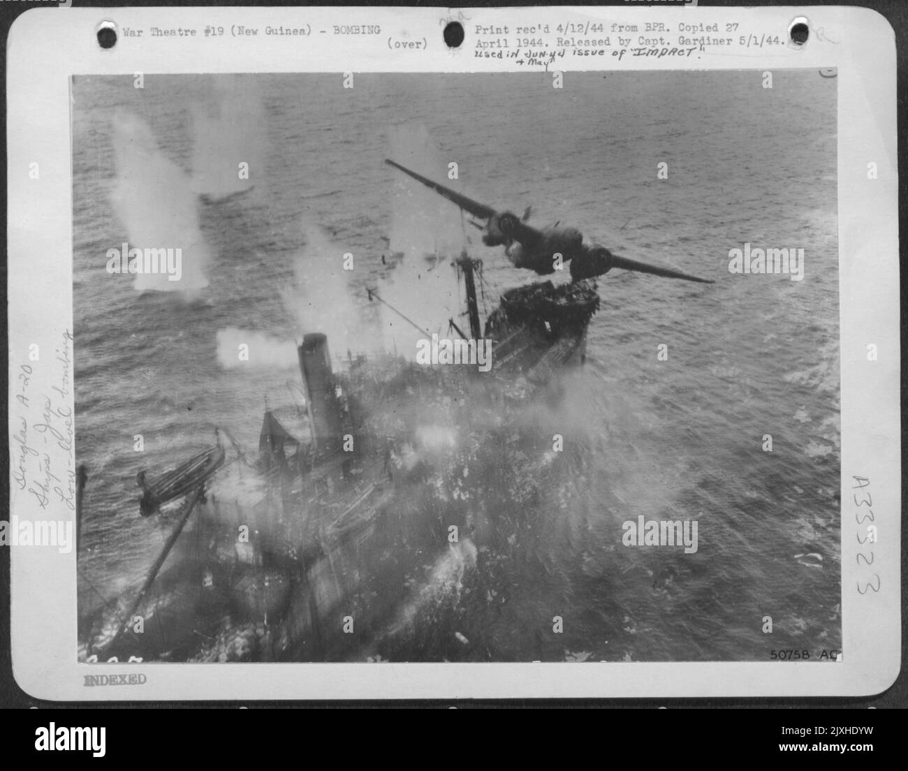 An A-20 skip bombing a freighter. Four splashes can be seen, two the ...