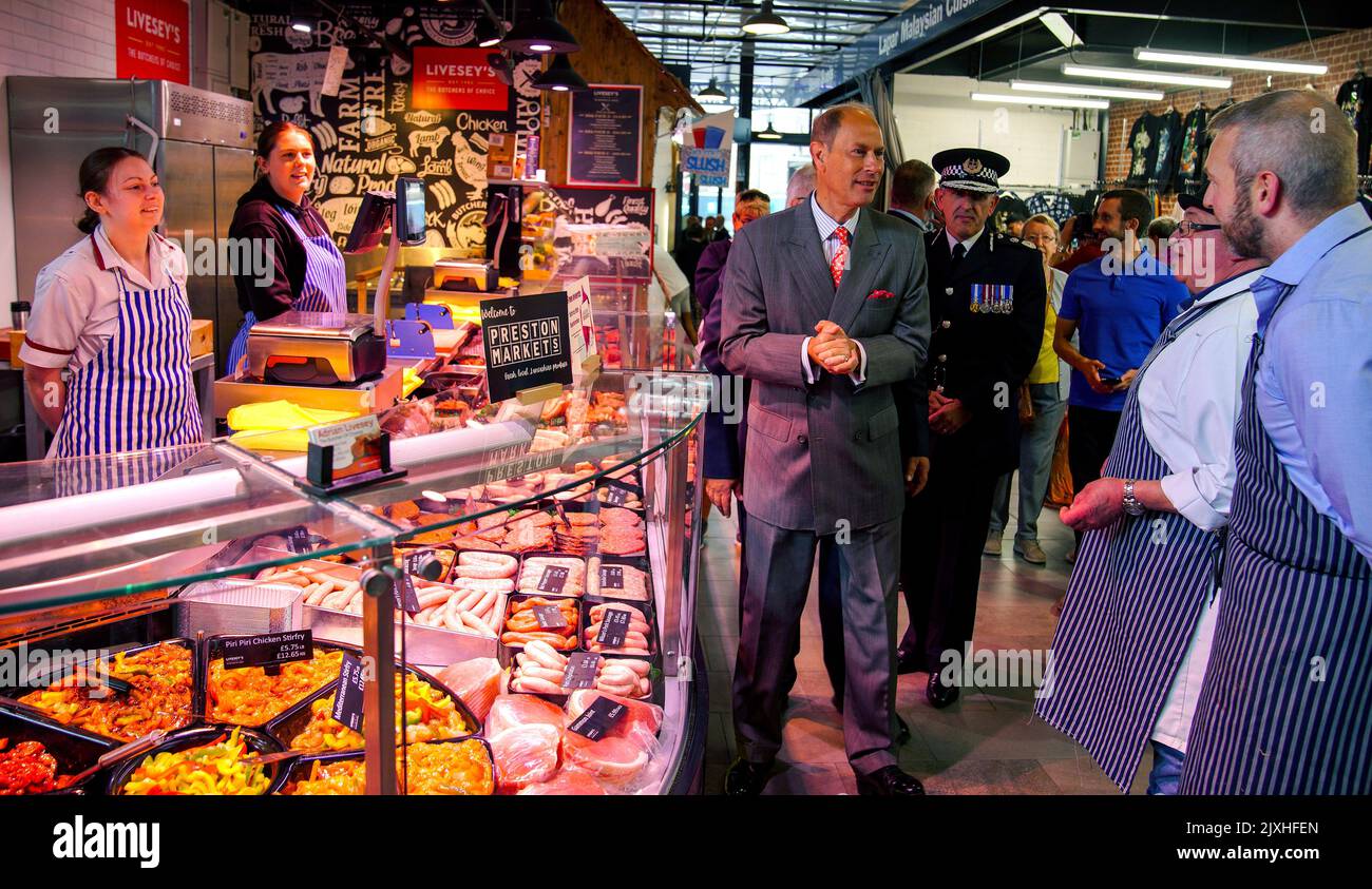 The Earl of Wessex talks to a local butcher during a visit to Preston ...