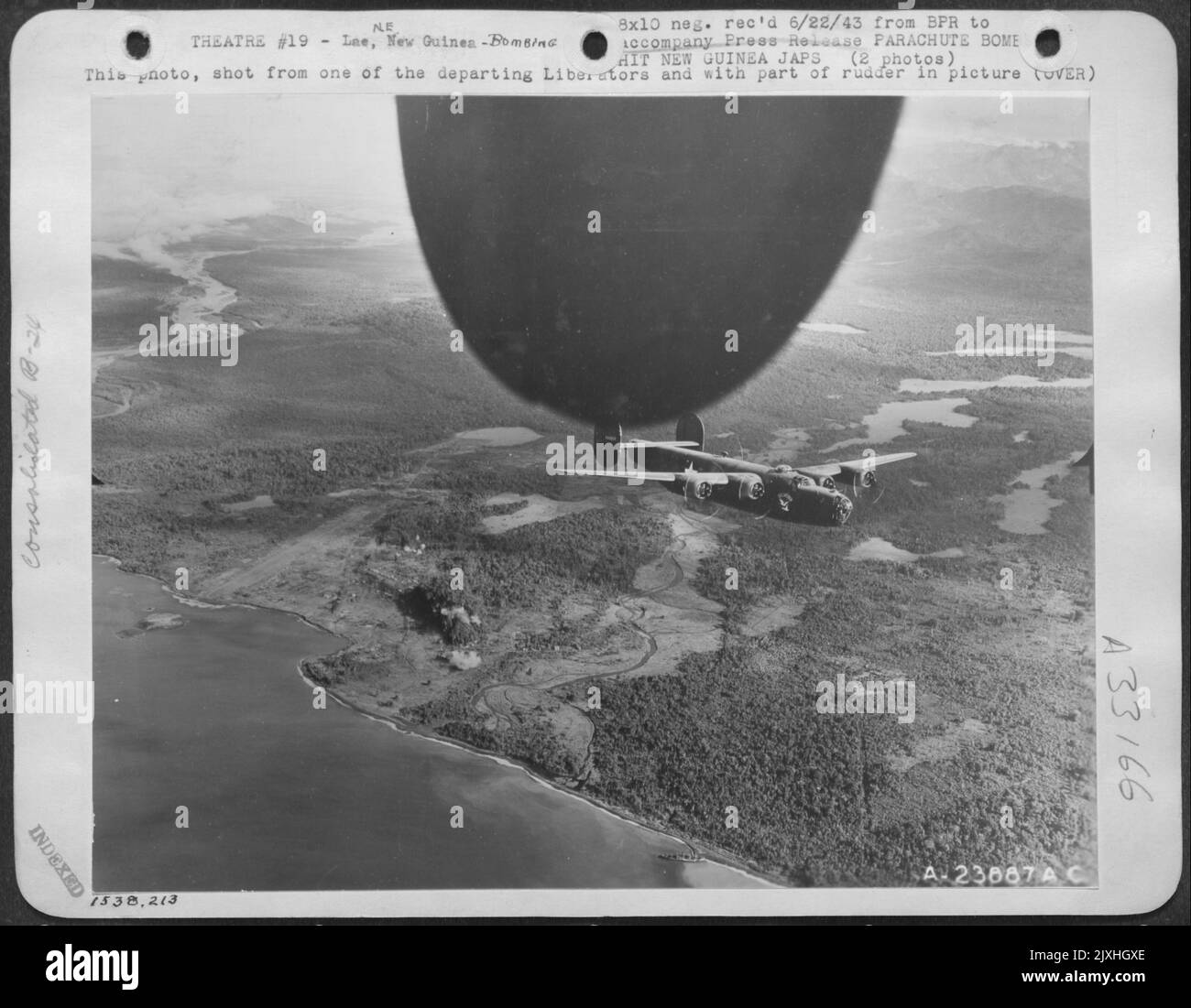 This photo, shot from one of the departing Liberators and with part of ...