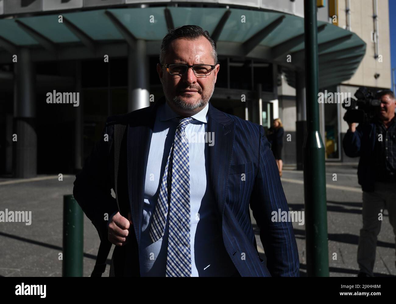 Adam Magill, defence lawyer for Christopher Britton, leaves the ...