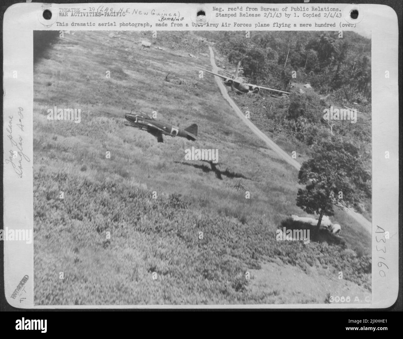 This dramatic aerial photograph, made from a U.S. Army Air Forces plane ...