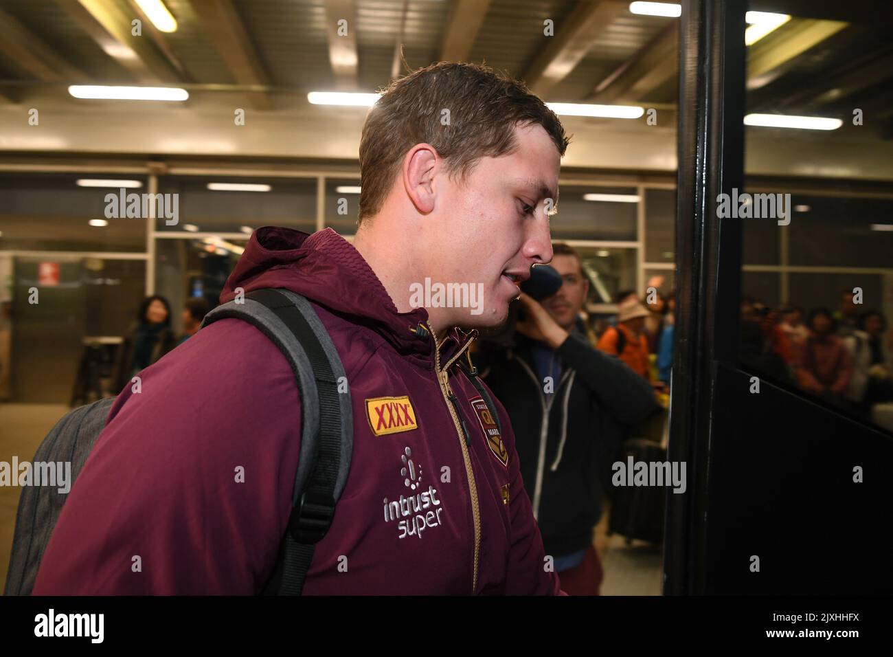 Coen Hess of the Queensland Maroons arrives at Sydney Domestic Airport ...