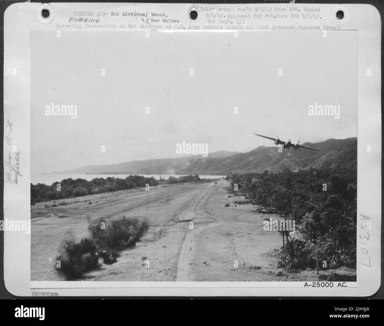 Spreading destruction on But airdrome as U.S. Army bomber strafe and ...
