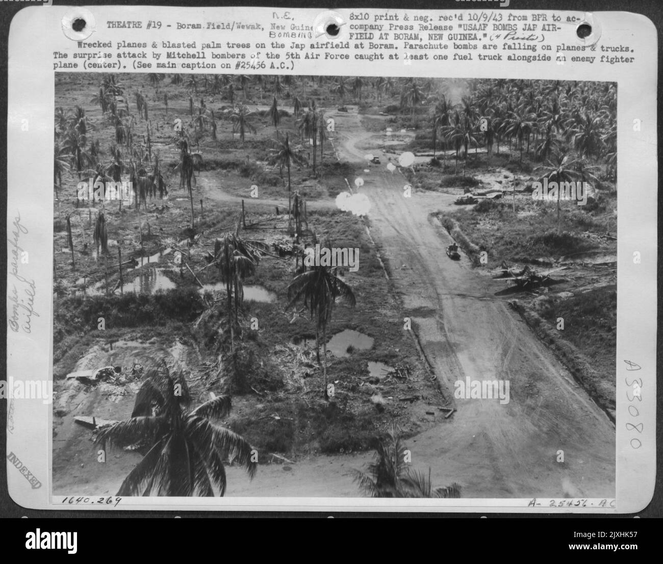 Wrecked planes & blasted palm trees on the Japanese airfield at Boram ...