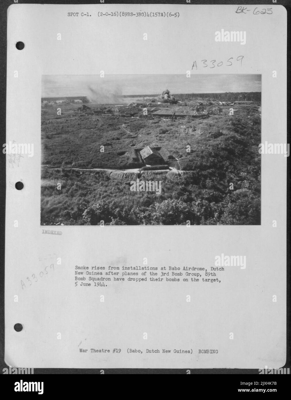 Smoke rises from installations at Babo Airdrome, Dutch New Guinea after ...